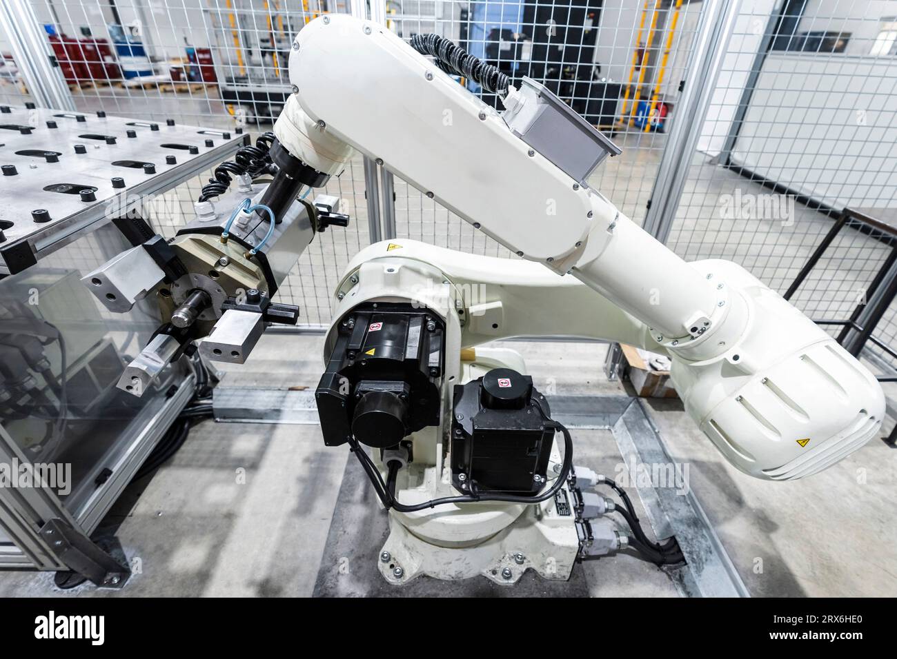 White robotic arm in industry Stock Photo - Alamy
