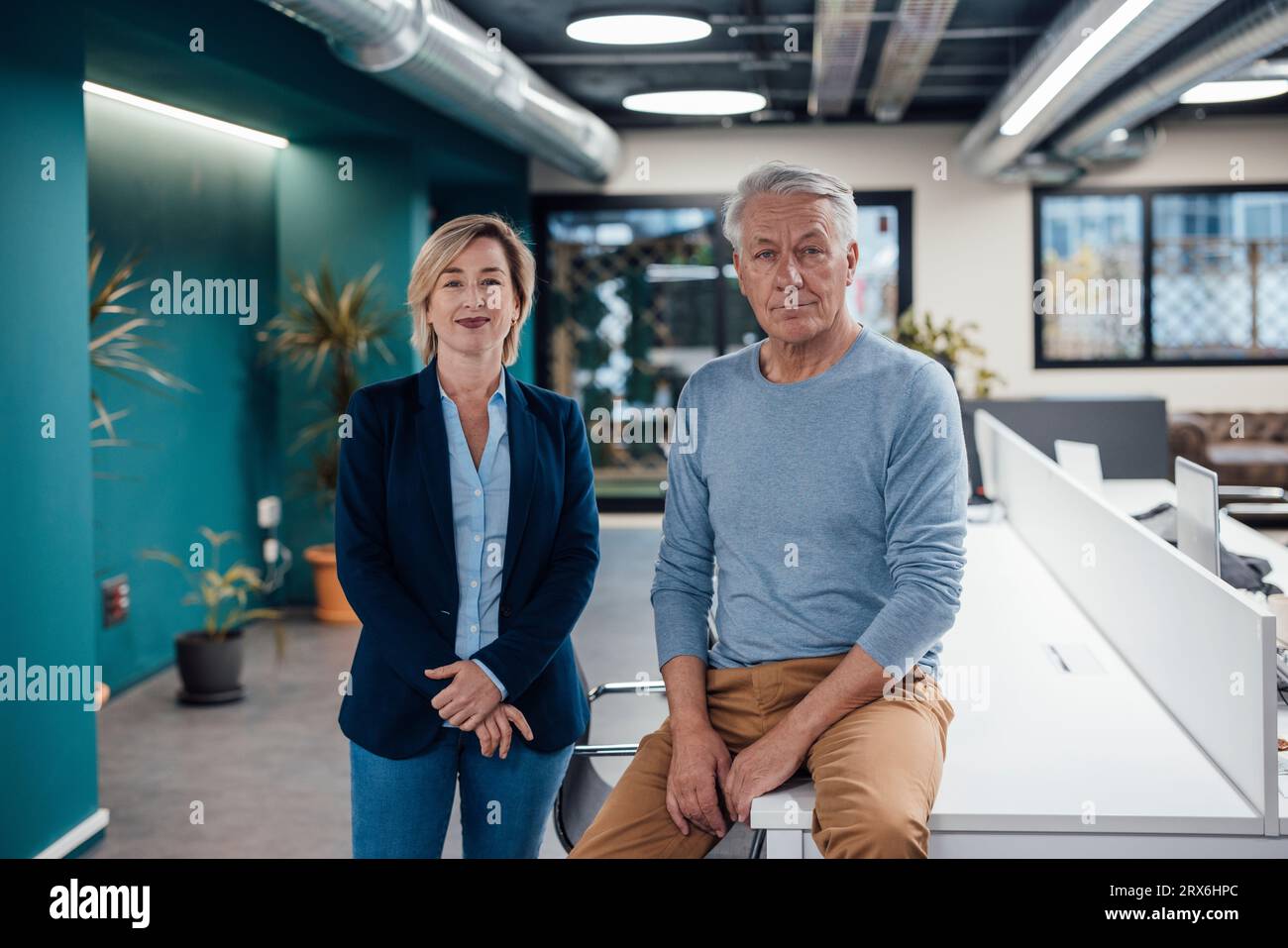 Two work colleagues portrait hi-res stock photography and images - Alamy
