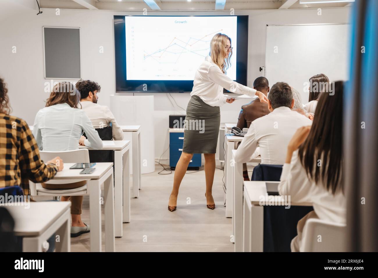 Multiracial students are about to have knowledge test at the classroom ...