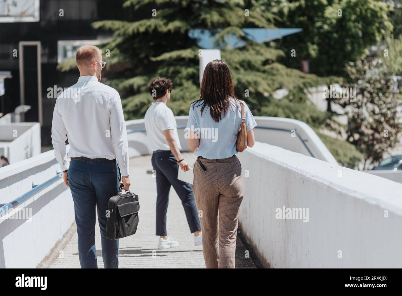 People going home after work. They are getting out of the building ...