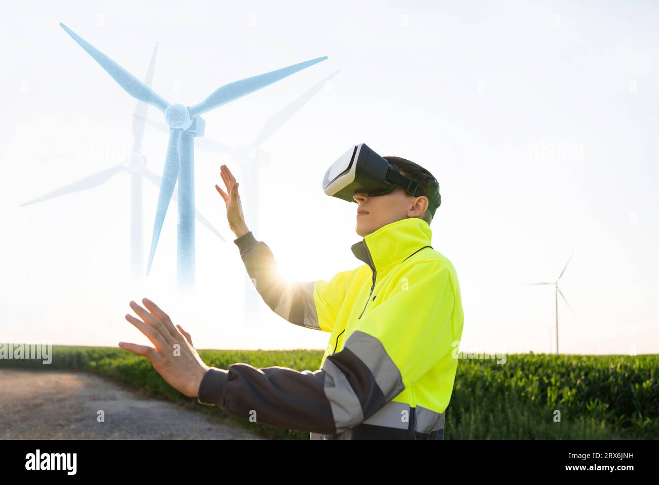 Engineer Examining Augmented Wind Turbine Model Through Vr Simulator On