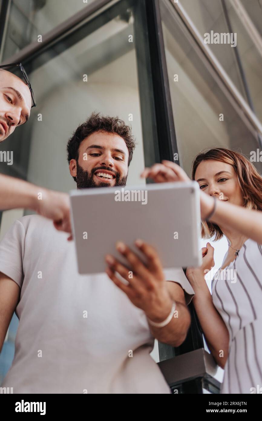 Managers reviewing reports hi-res stock photography and images - Alamy