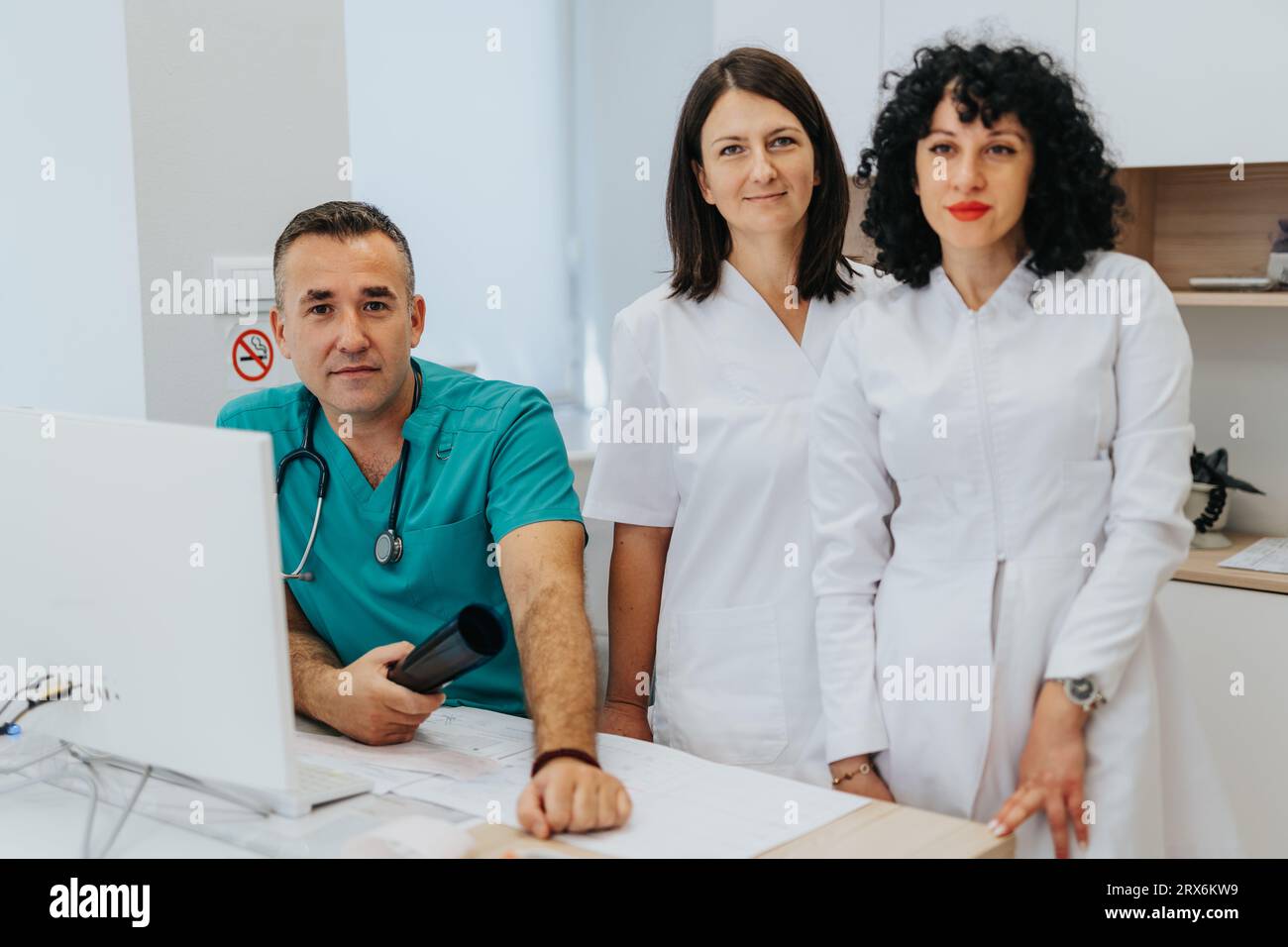 Two nurses posing patient hi-res stock photography and images - Alamy