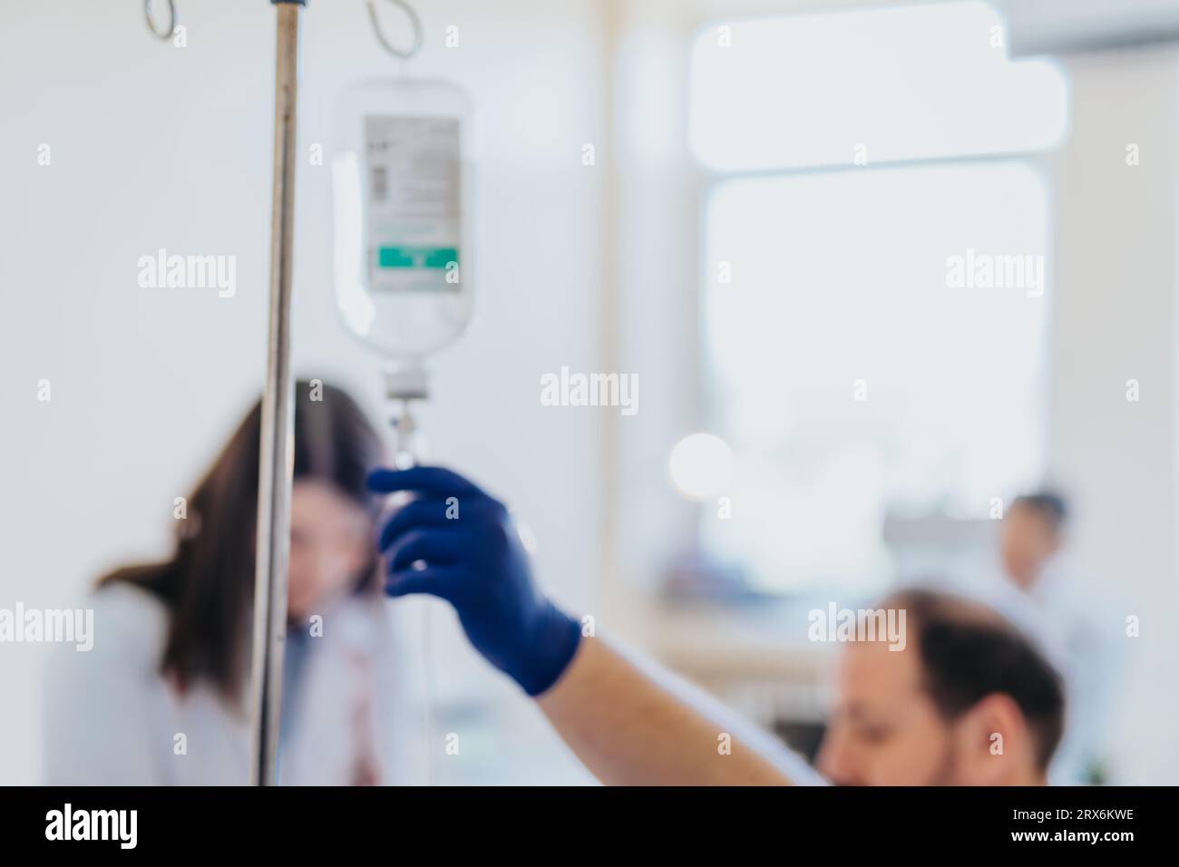 Experienced doctor providing medical care, infusion therapy, and health ...