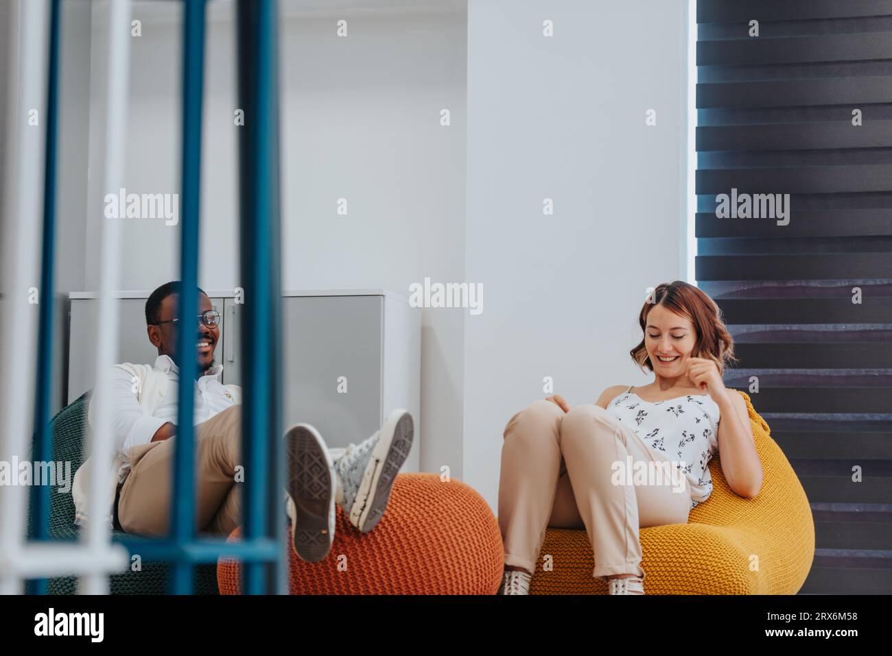 Business partners, executives, and employees of different generations ...