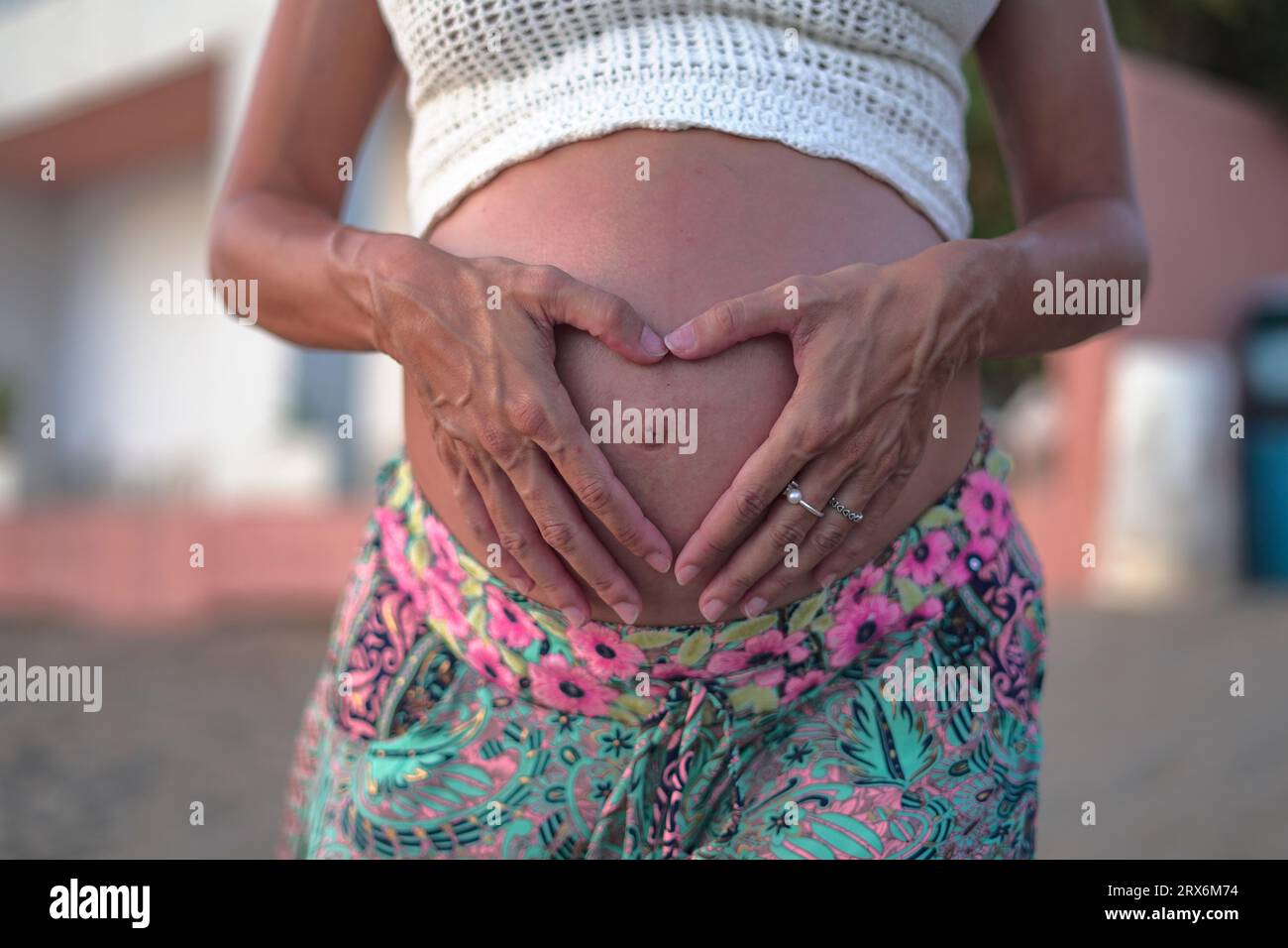 Woman stomach heart shape hi-res stock photography and images - Alamy