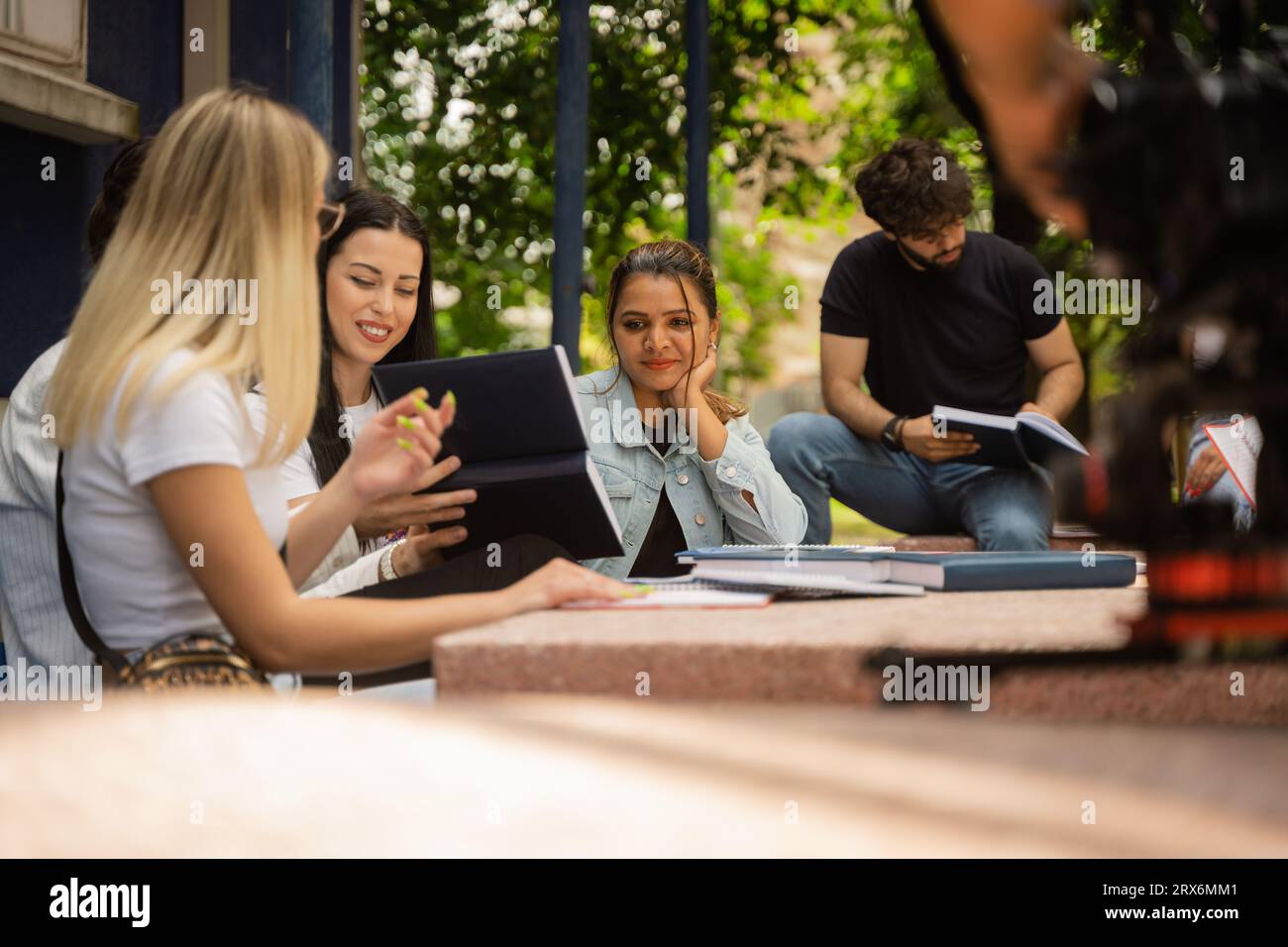 Diverse group of students collaborating hi-res stock photography and ...