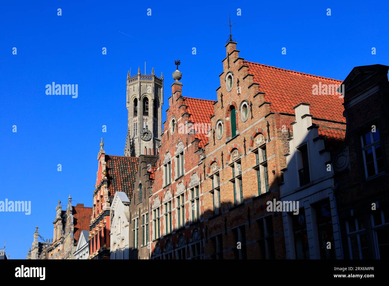 Belgium, West Flanders, Bruges, Historic houses with Belfry of Bruges ...
