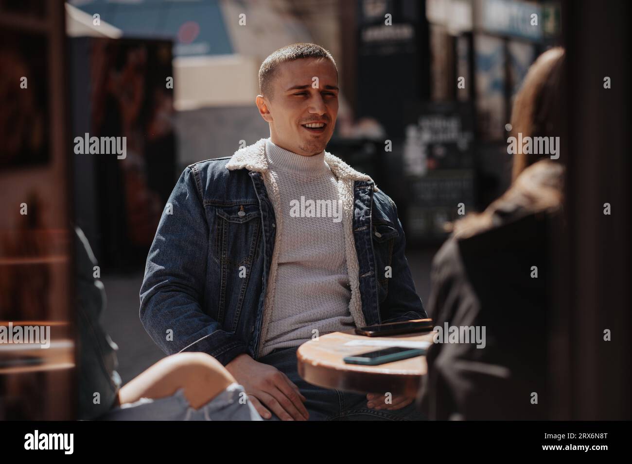 Male best friends talking cafe hi-res stock photography and images - Alamy