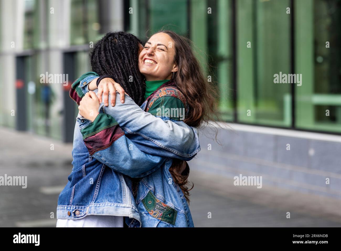 Man hugging cheerful girlfriend hi-res stock photography and images - Alamy