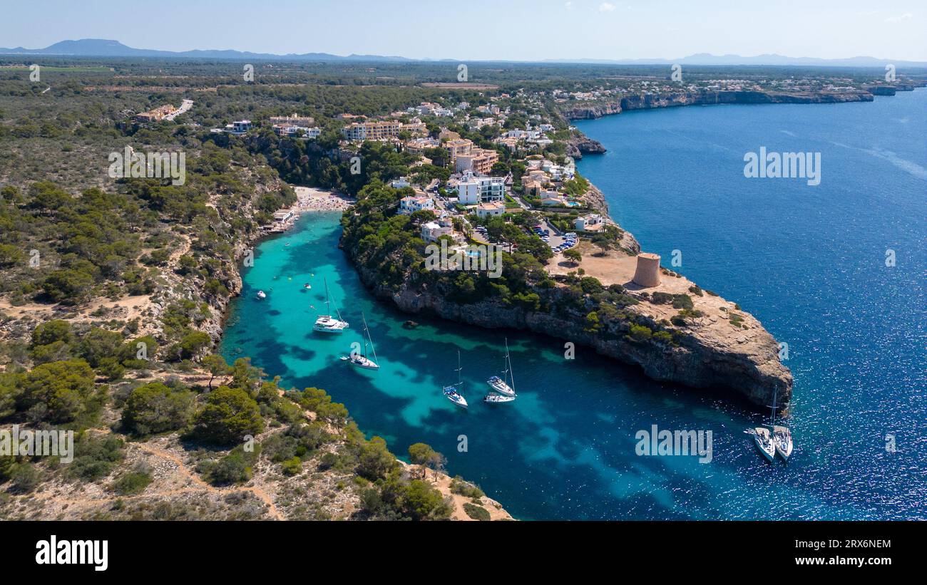 Picture dated June 2023 shows the beach and holiday resort of Cala Pi ...