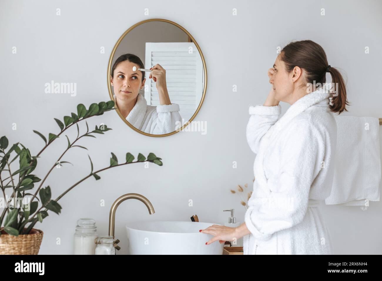 Woman doing facial skin therapy hi-res stock photography and images - Alamy