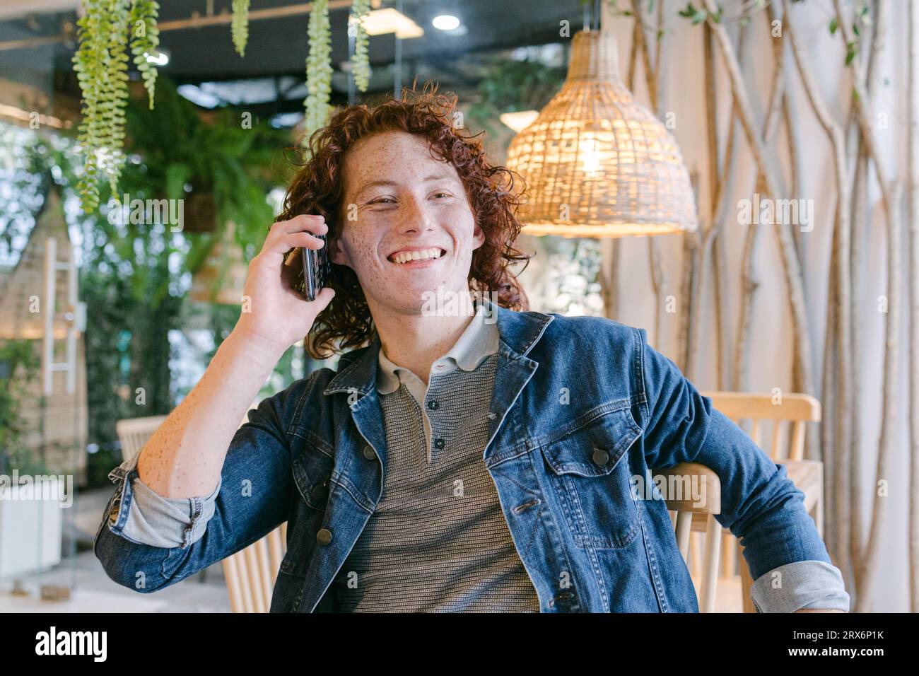 Happy young man talking hi-res stock photography and images - Alamy