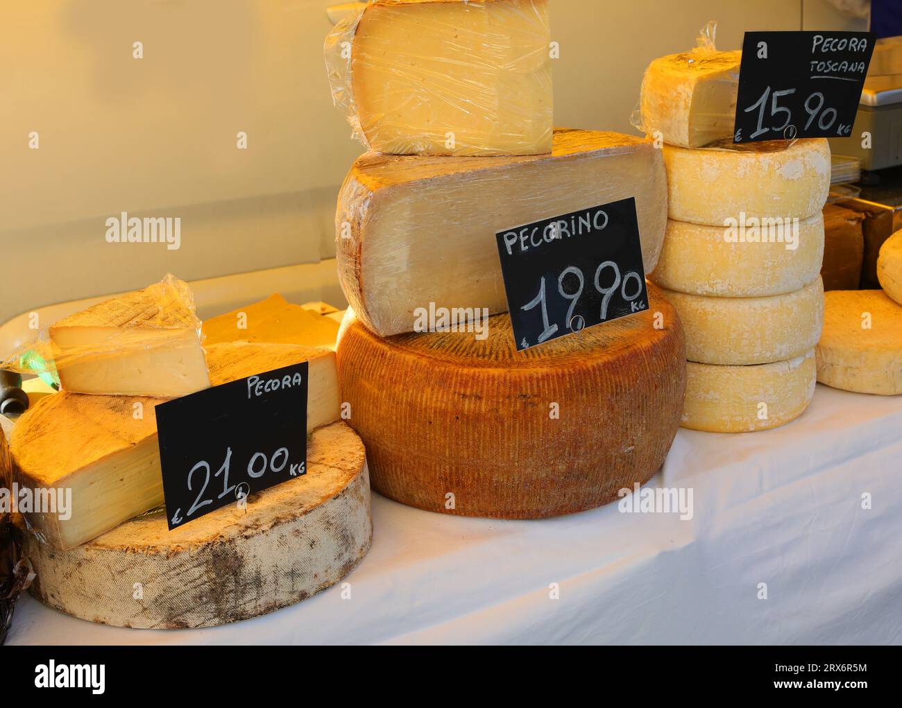 stall selling mature sheep s cheeses and a large wheel of pecorino ...