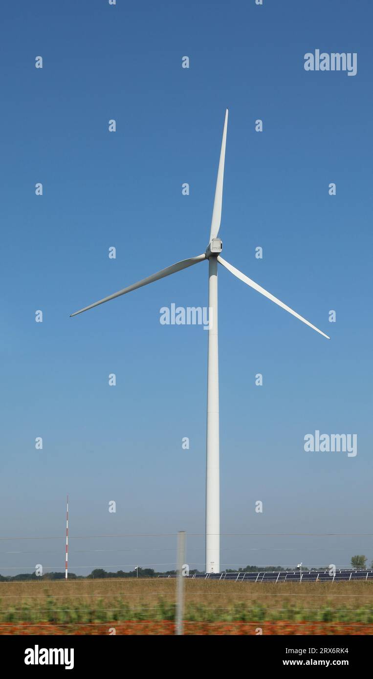 large wind turbine that uses wind energy to generate clean non ...