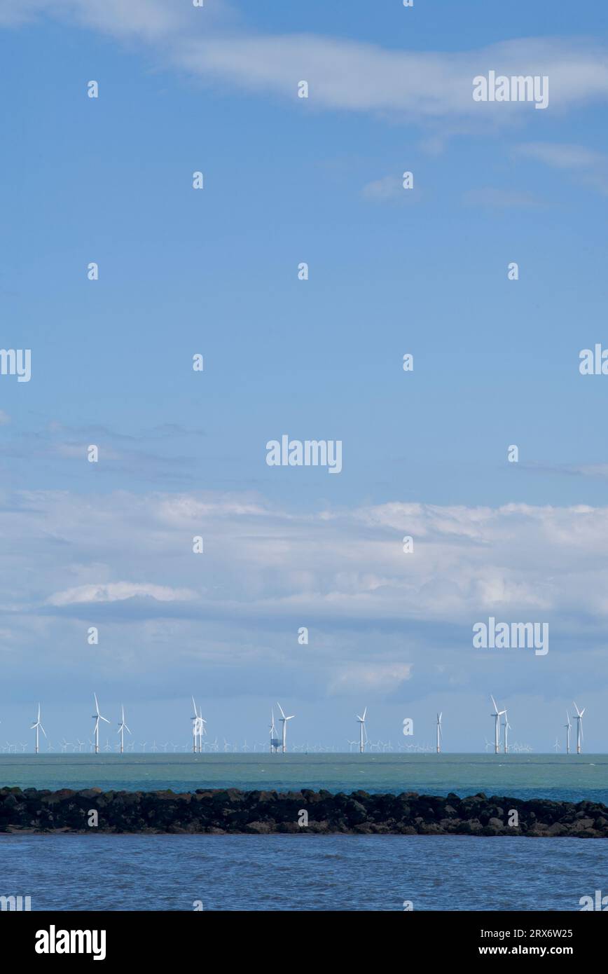Wind turbines offshore off Clacton on Sea Essex Stock Photo - Alamy