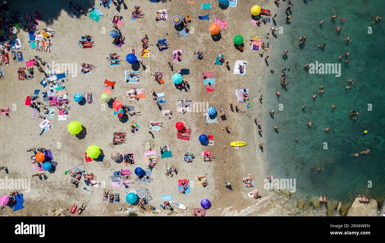Picture dated June 25th shows a drone image of busy beach in Cala Pi in ...