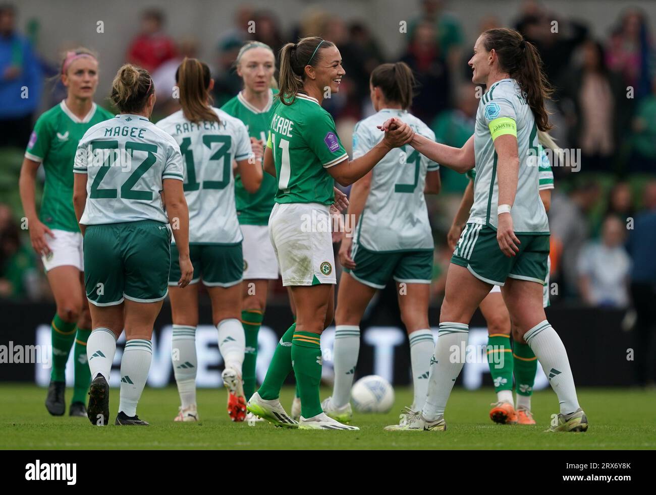 Republic of Ireland captain Katie McCabe (centre) shakes hands with ...
