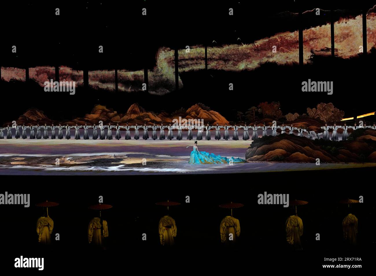 Artists perform during the opening ceremony of the 19th Asian Games in ...