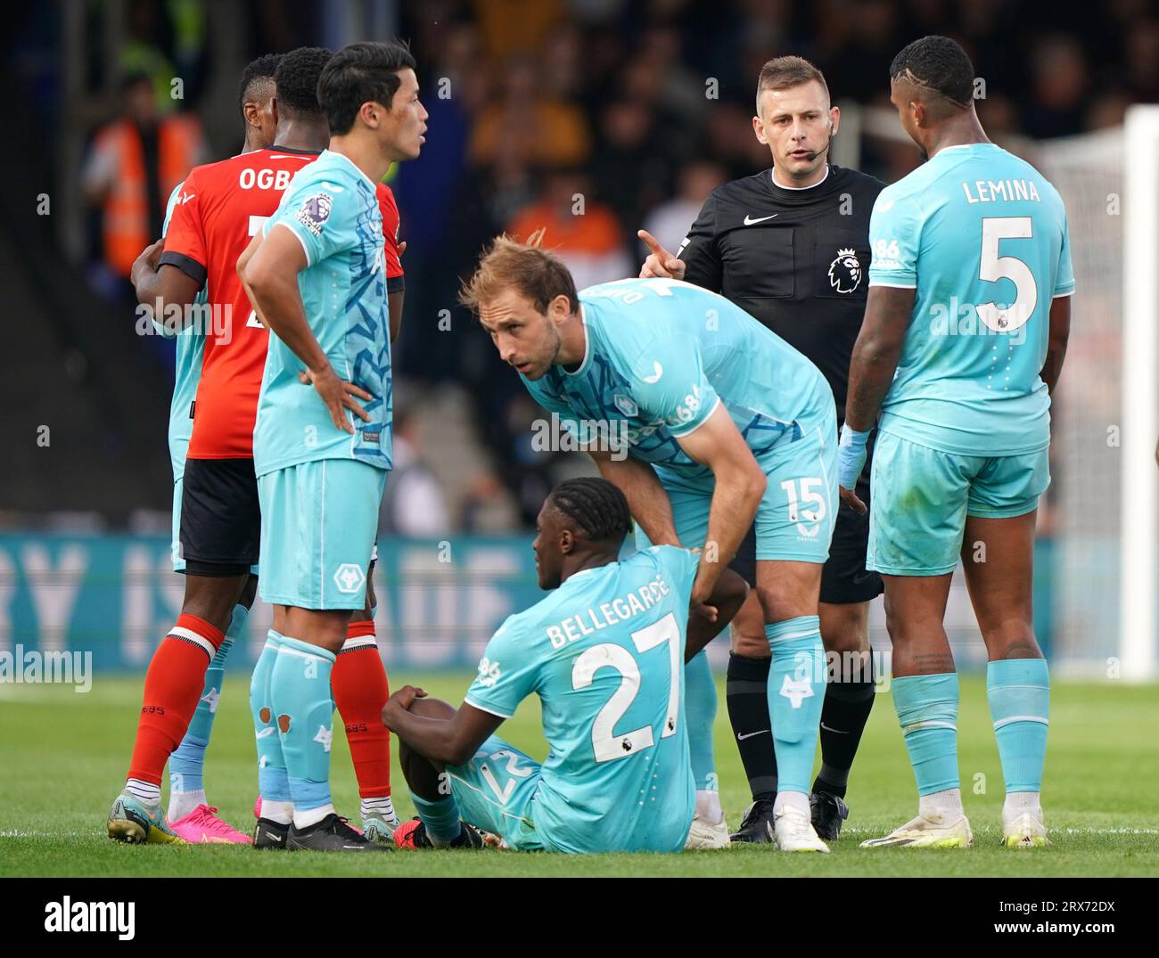 Wolverhampton Wanderers' Jean-Ricner Bellegarde (floor) reacts after ...