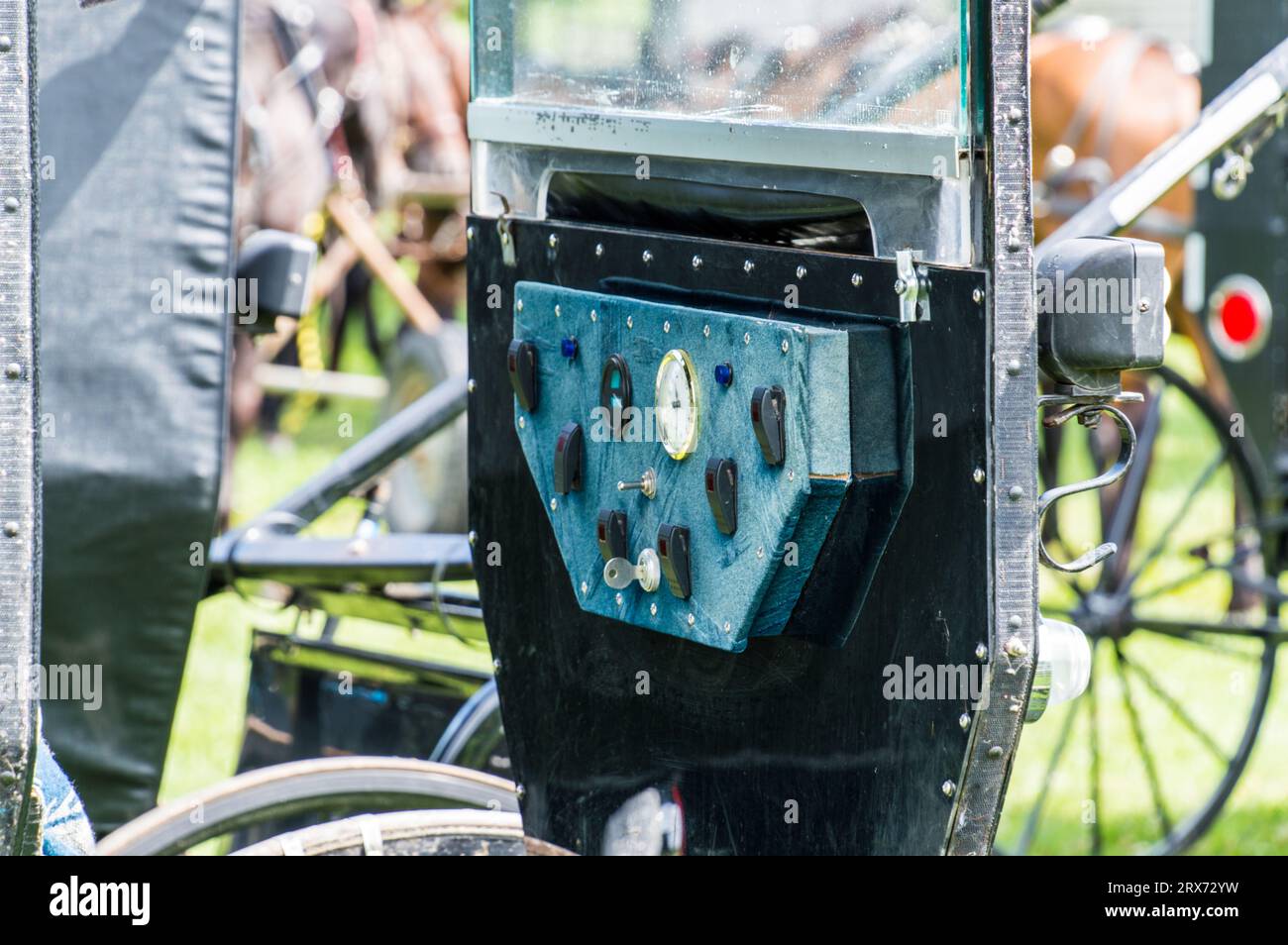 Electric controls in Amish buggy drawn by horse Stock Photo - Alamy