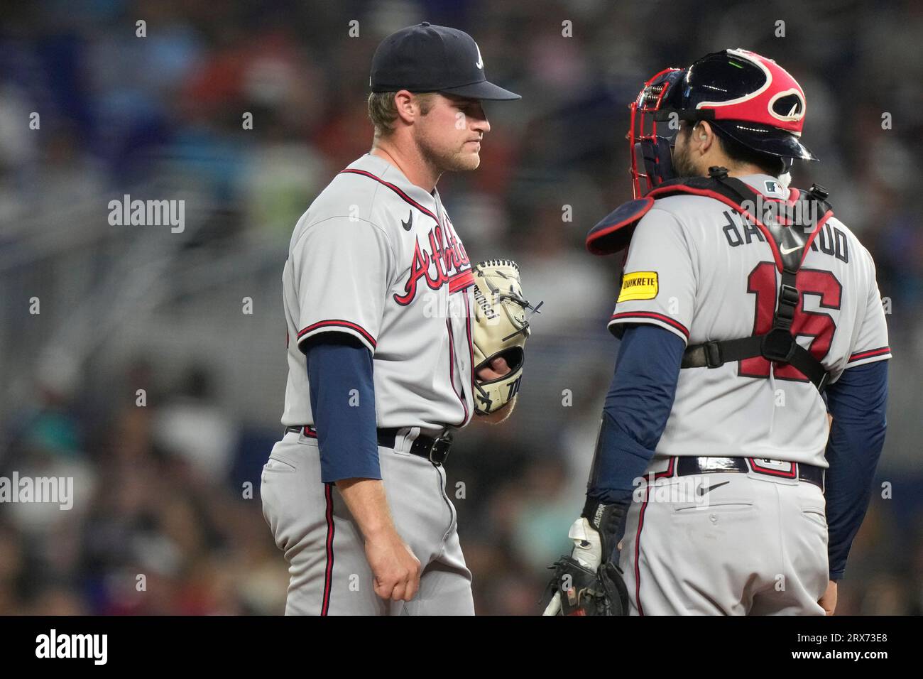 Atlanta Braves starting pitcher Bryce Elder, left, talks with catcher ...