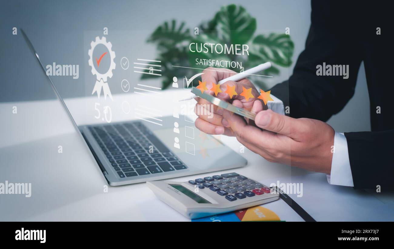 Business people use computers and telephones to analyze customer ...