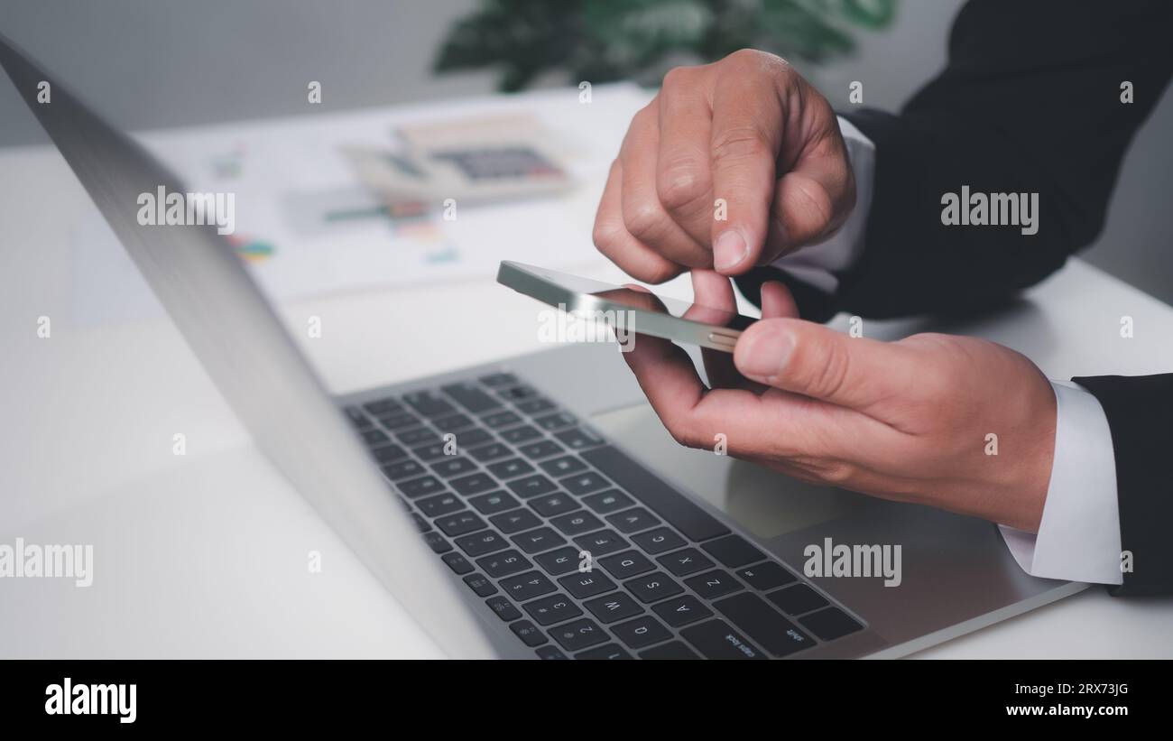 Businessman checking email on the phone screen. New email notification ...