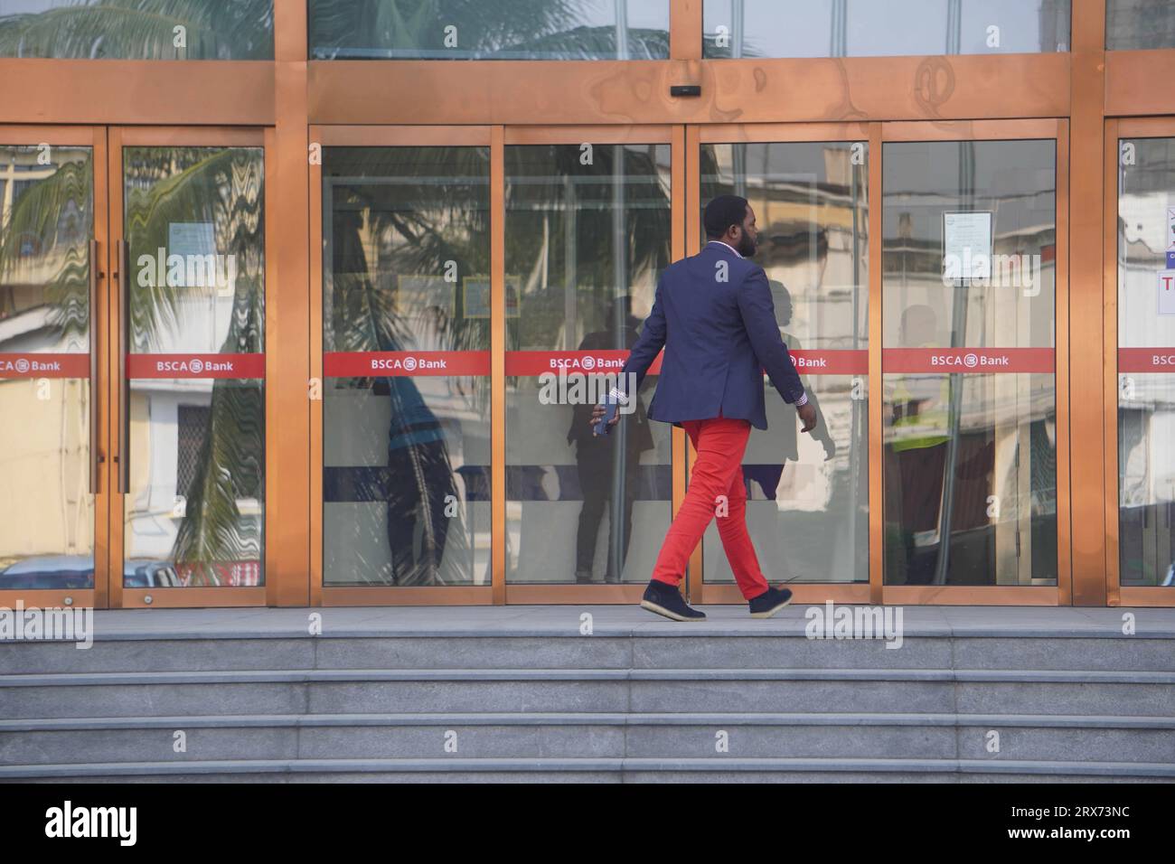 Brazzaville, Republic of the Congo. 21st Sep, 2023. A client enters the ...