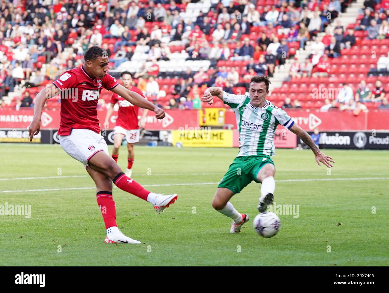 Charlton Athletic's Miles Leaburn (left) scores their side's first goal ...