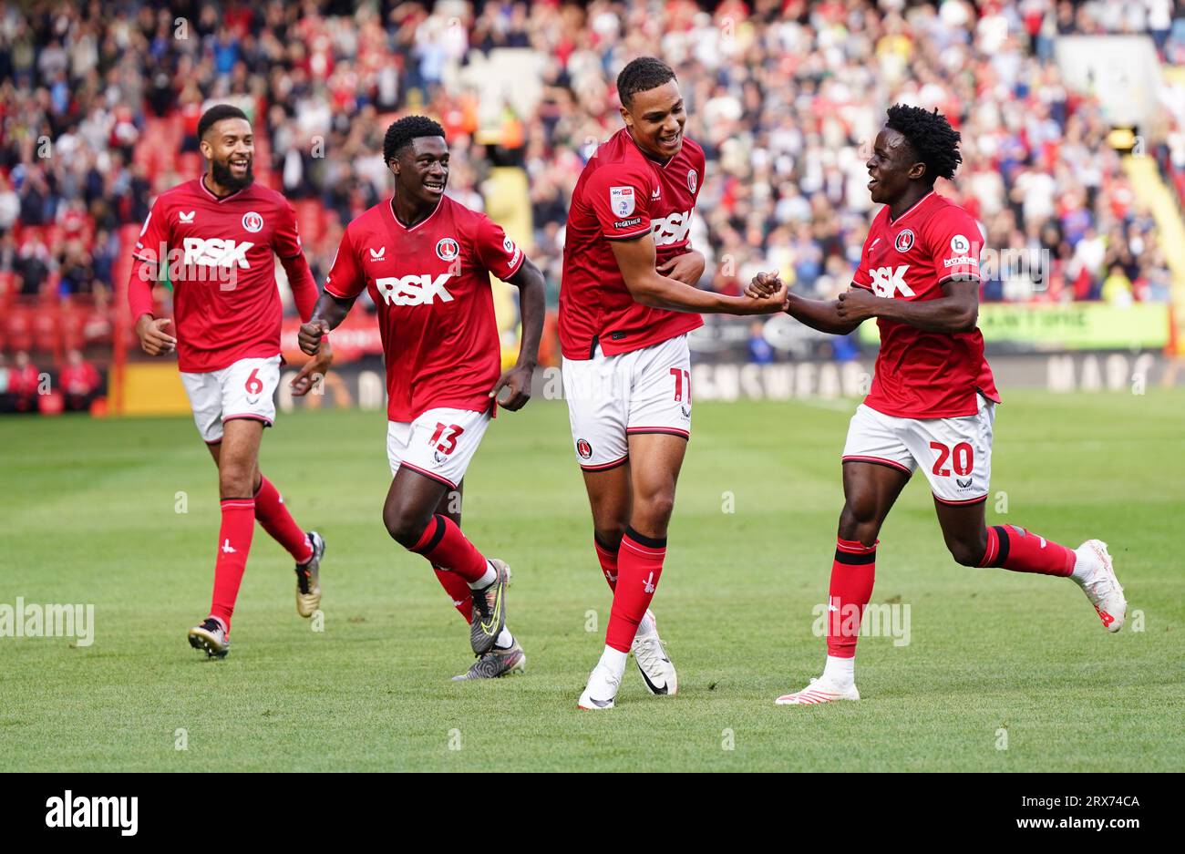 Charlton Athletic's Miles Leaburn (centre-right) celebrates scoring ...