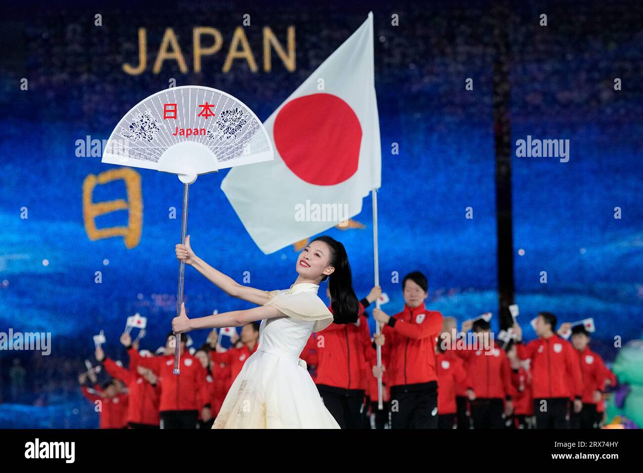 Japan's athletes and team officials arrive during the opening ceremony ...