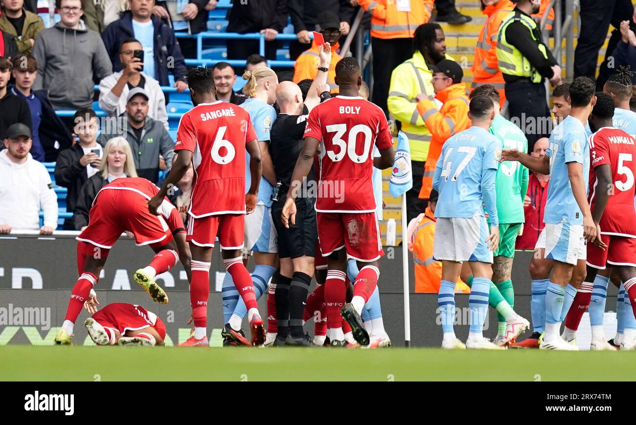 MANCHESTER, UK. 23rd Sep, 2023. Referee Anthony Taylor shows the red ...