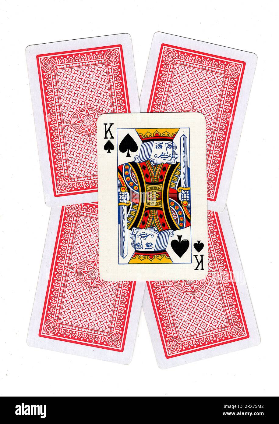 A hand of playing cards showing a king on card backs Stock Photo - Alamy