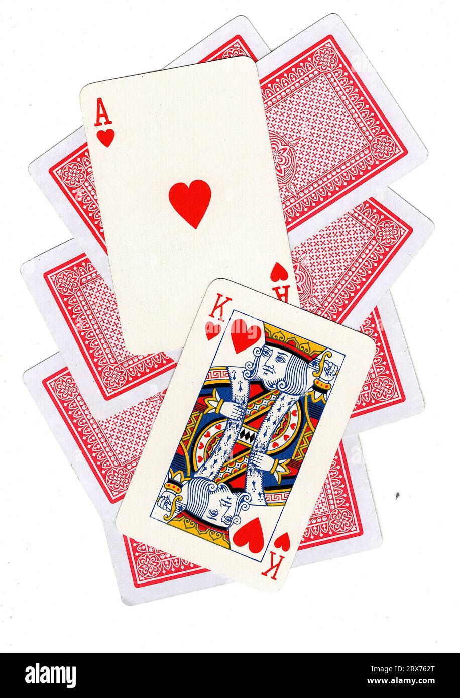 A blackjack hand of playing cards showing an ace and king on card backs ...