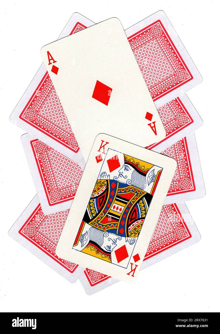 A blackjack hand of playing cards showing an ace and king on card backs ...