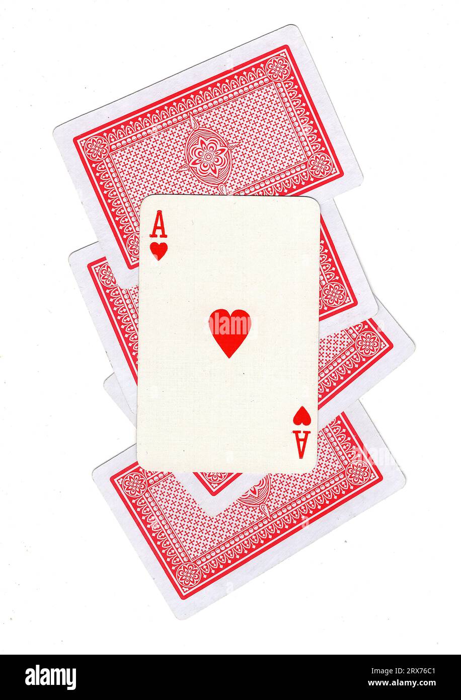 A montage of vintage playing card backs with the ace of hearts revealed ...