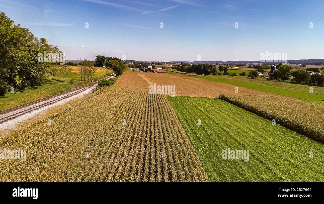 An Aerial View, in Late Afternoon, of Farmlands, Corn Fields, Silos ...