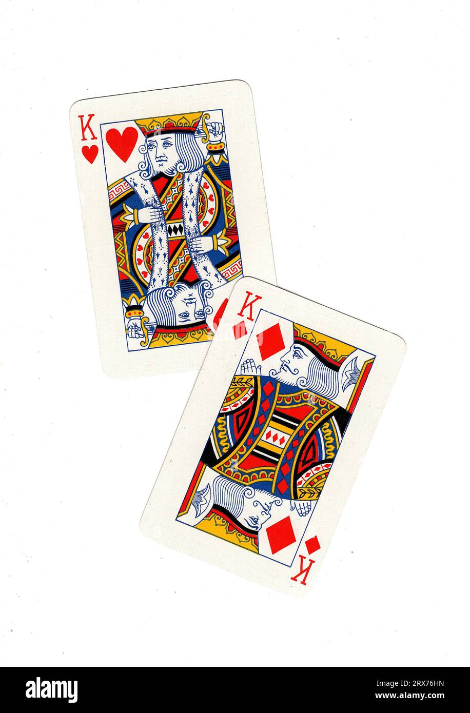Vintage playing cards showing a pair of kings on a white background ...