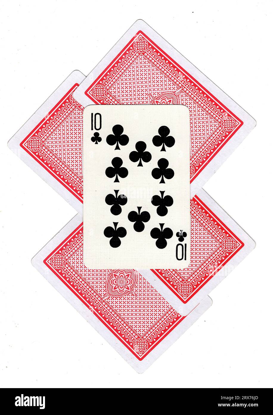 A montage of vintage playing card backs with the ten of clubs revealed ...