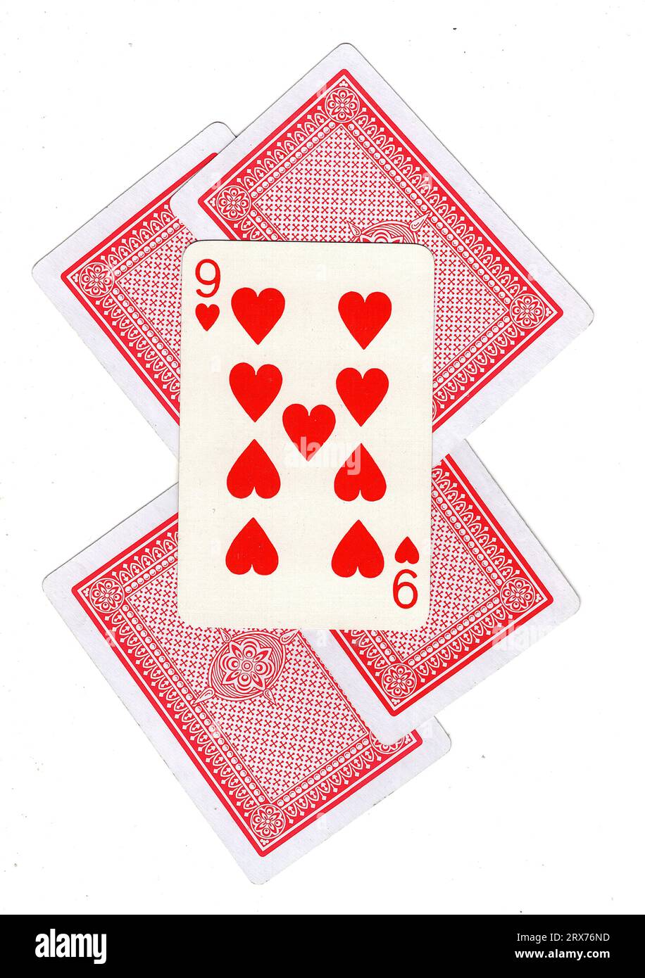 A montage of vintage playing card backs with the nine of hearts ...