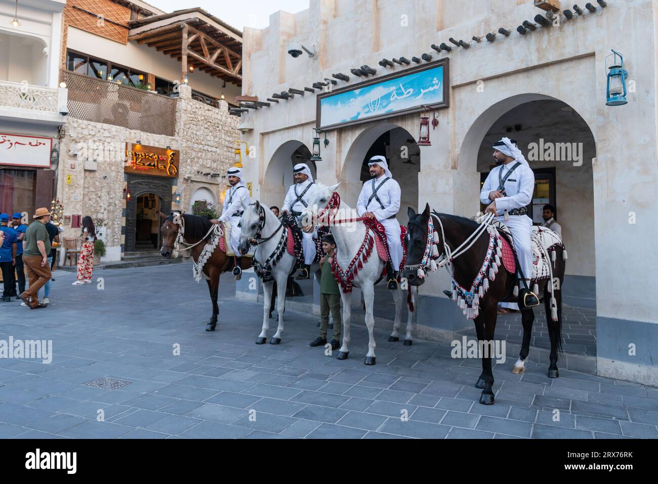 Doha, Qatar - Oct 17, 2022: Tourist police in traditional Qatari dress ...