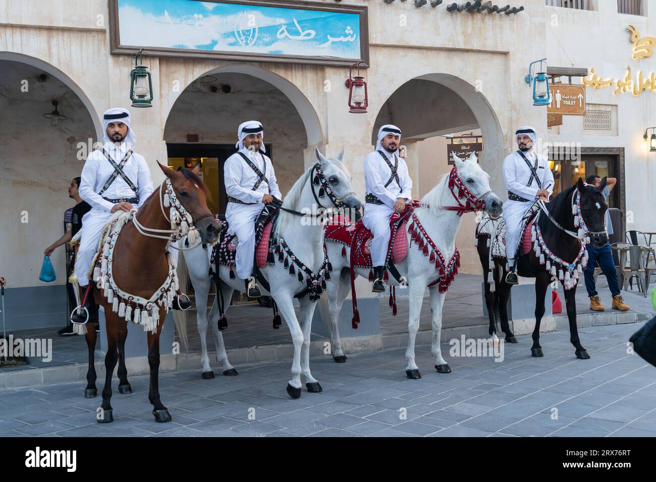 Doha, Qatar - Oct 17, 2022: Tourist police in traditional Qatari dress ...