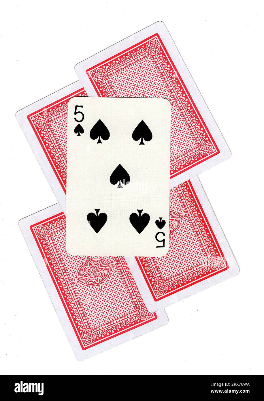 A montage of vintage playing card backs with the five of spades ...