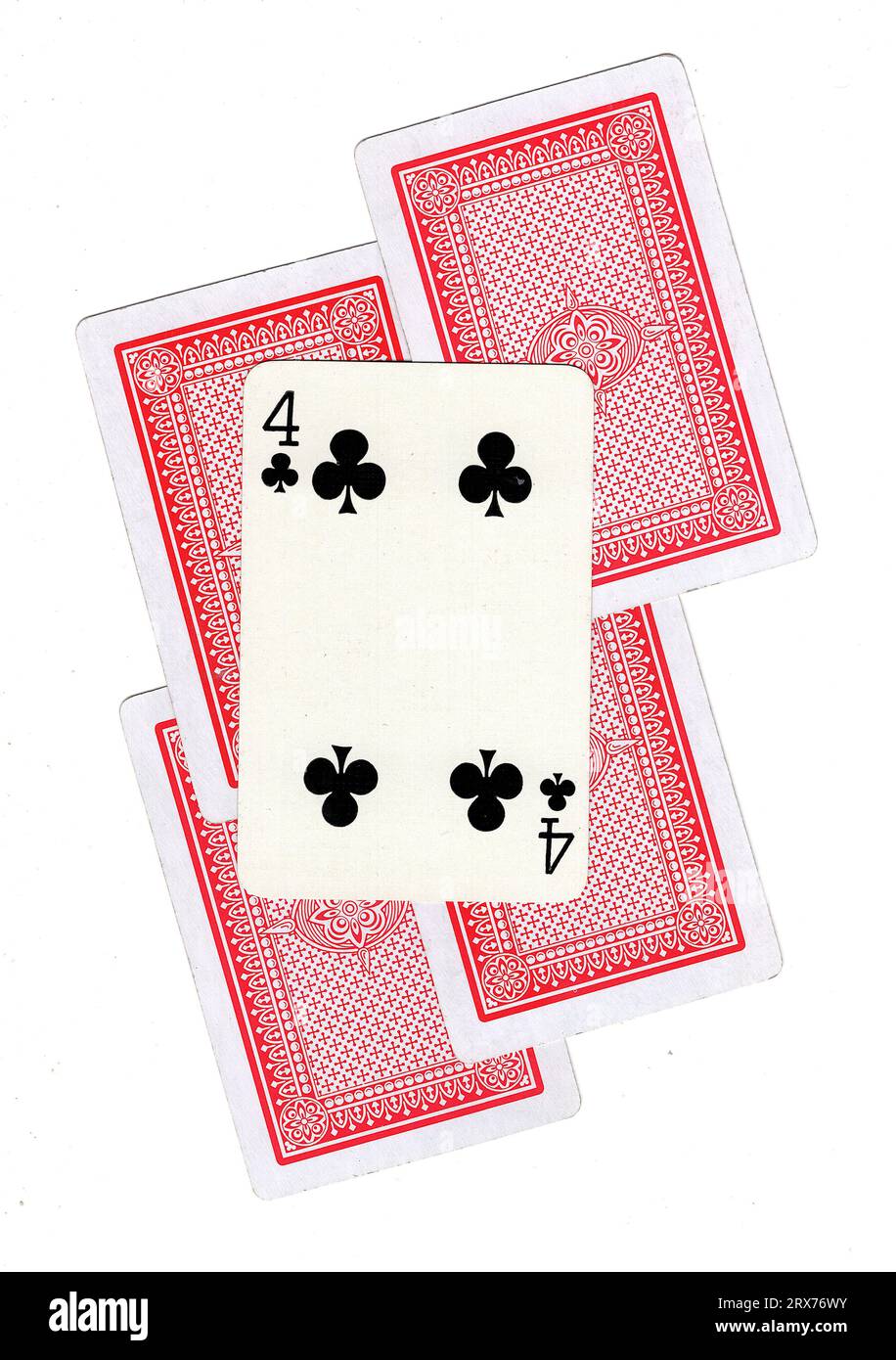 A montage of vintage playing card backs with the four of clubs revealed ...