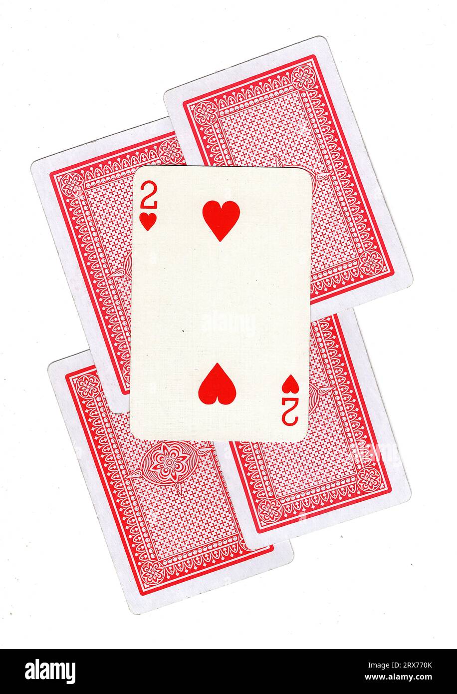 A montage of vintage playing card backs with the two of hearts revealed ...