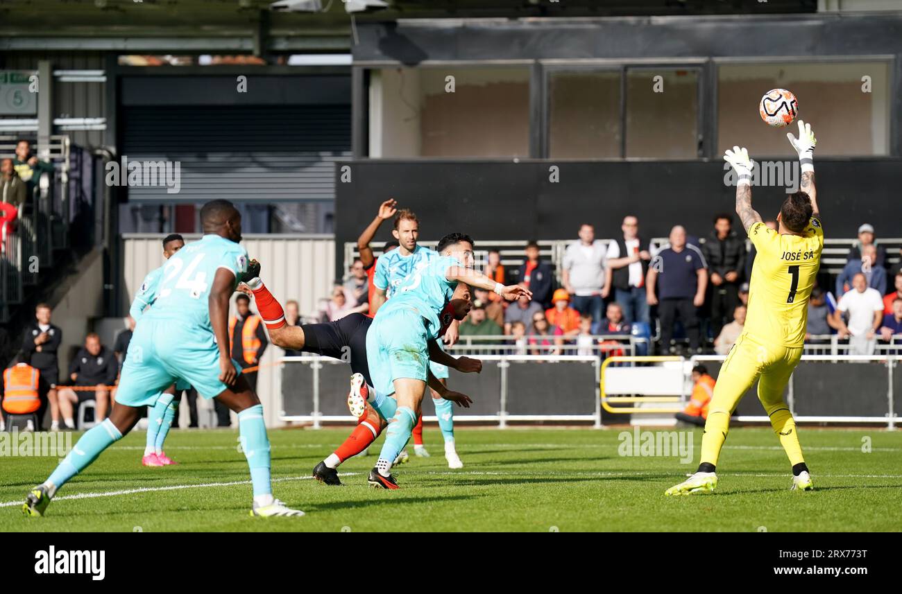 Wolverhampton Wanderers goalkeeper Jose Sa (right) saves a shot from ...