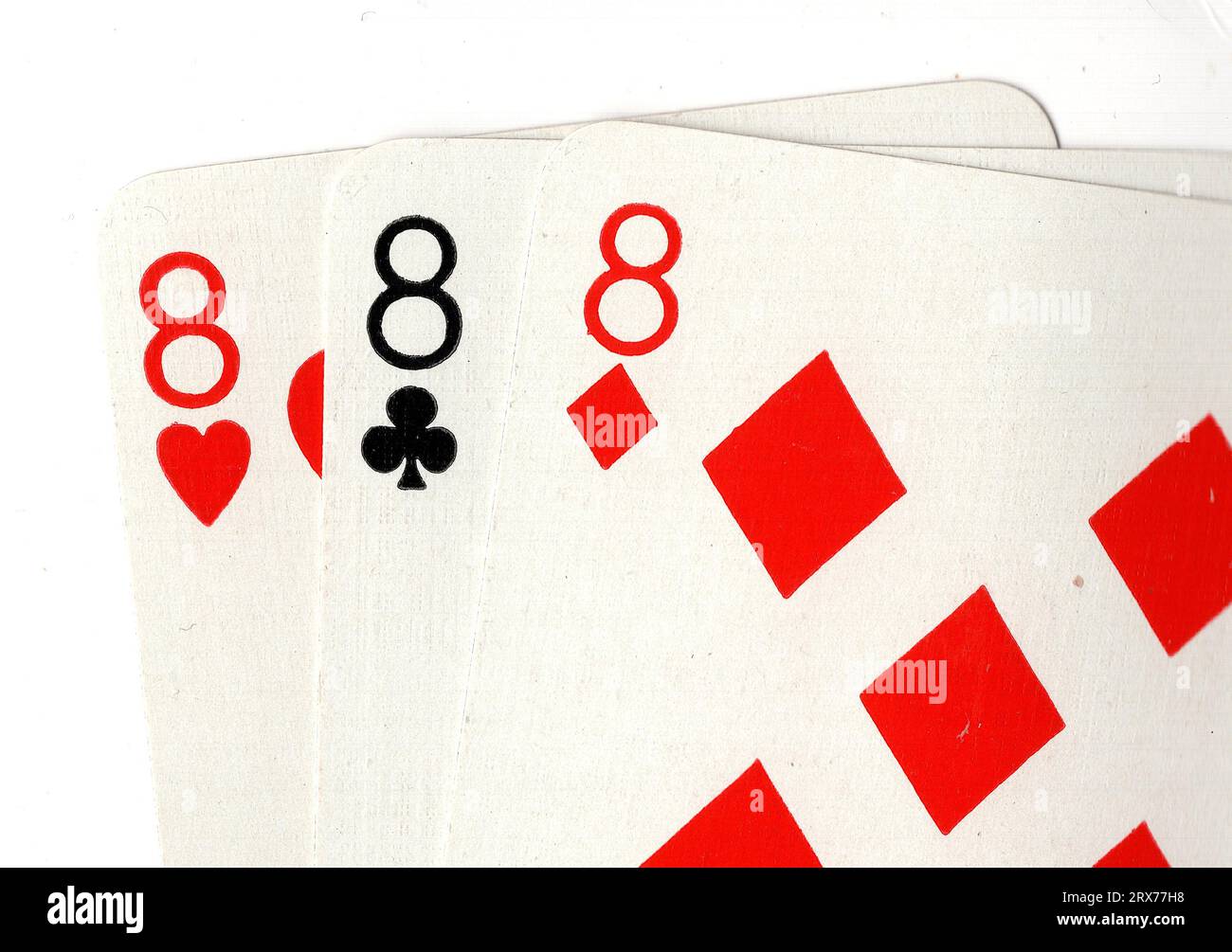 Vintage playing cards showing three eights on a white background Stock Photo - Alamy