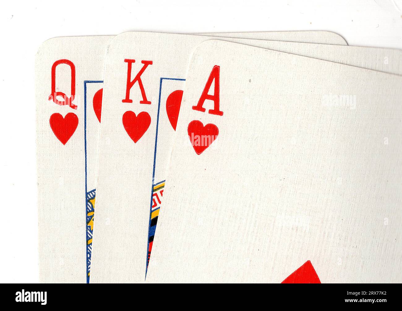 A hand of vintage playing cards featuring a queen, king and ace of ...