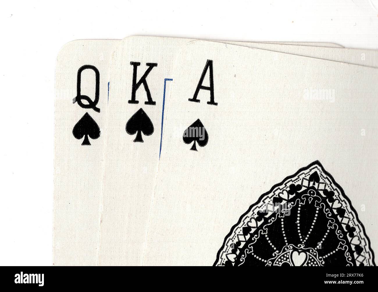 A hand of vintage playing cards featuring a queen, king and ace of ...